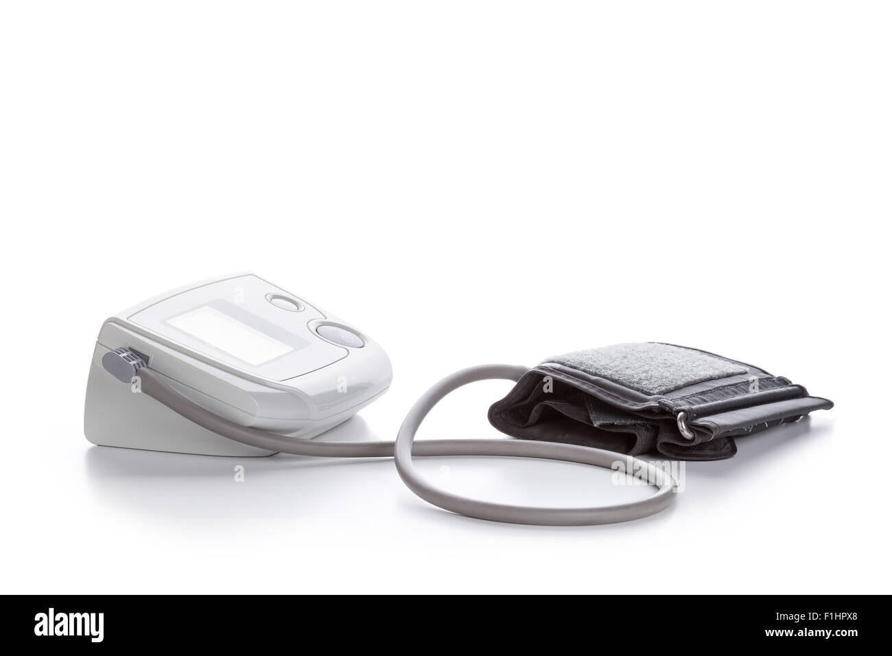 Digital Blood Pressure Monitor closeup on white background Stock Photo ...