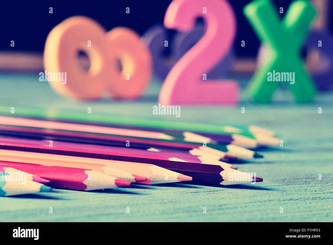 closeup of a pile of pencil crayons of different colors and some ...