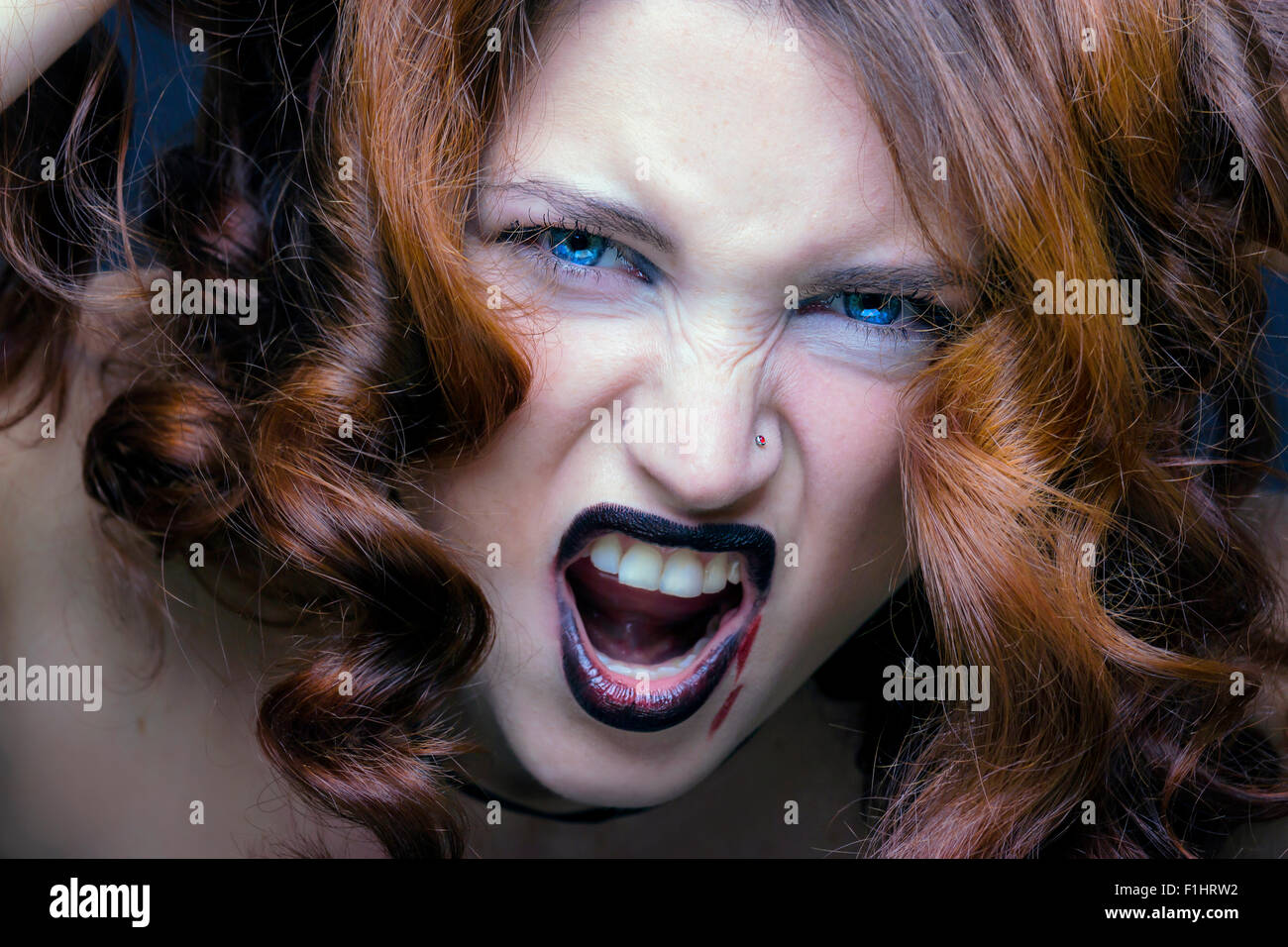 Female vampire blood face hi-res stock photography and images - Alamy