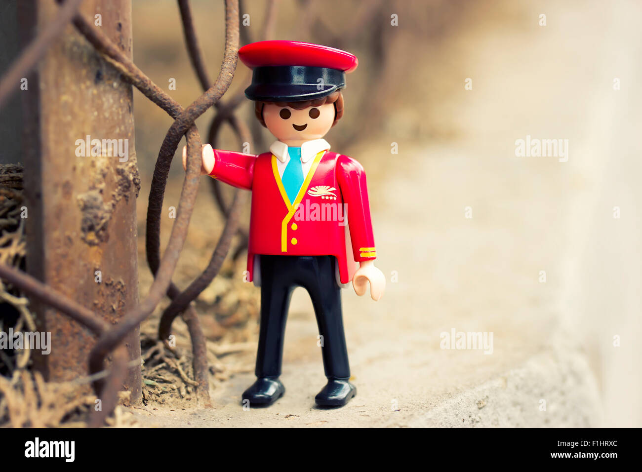 Miniature plastic toy. Man in the form of a passenger plane pilot Stock ...