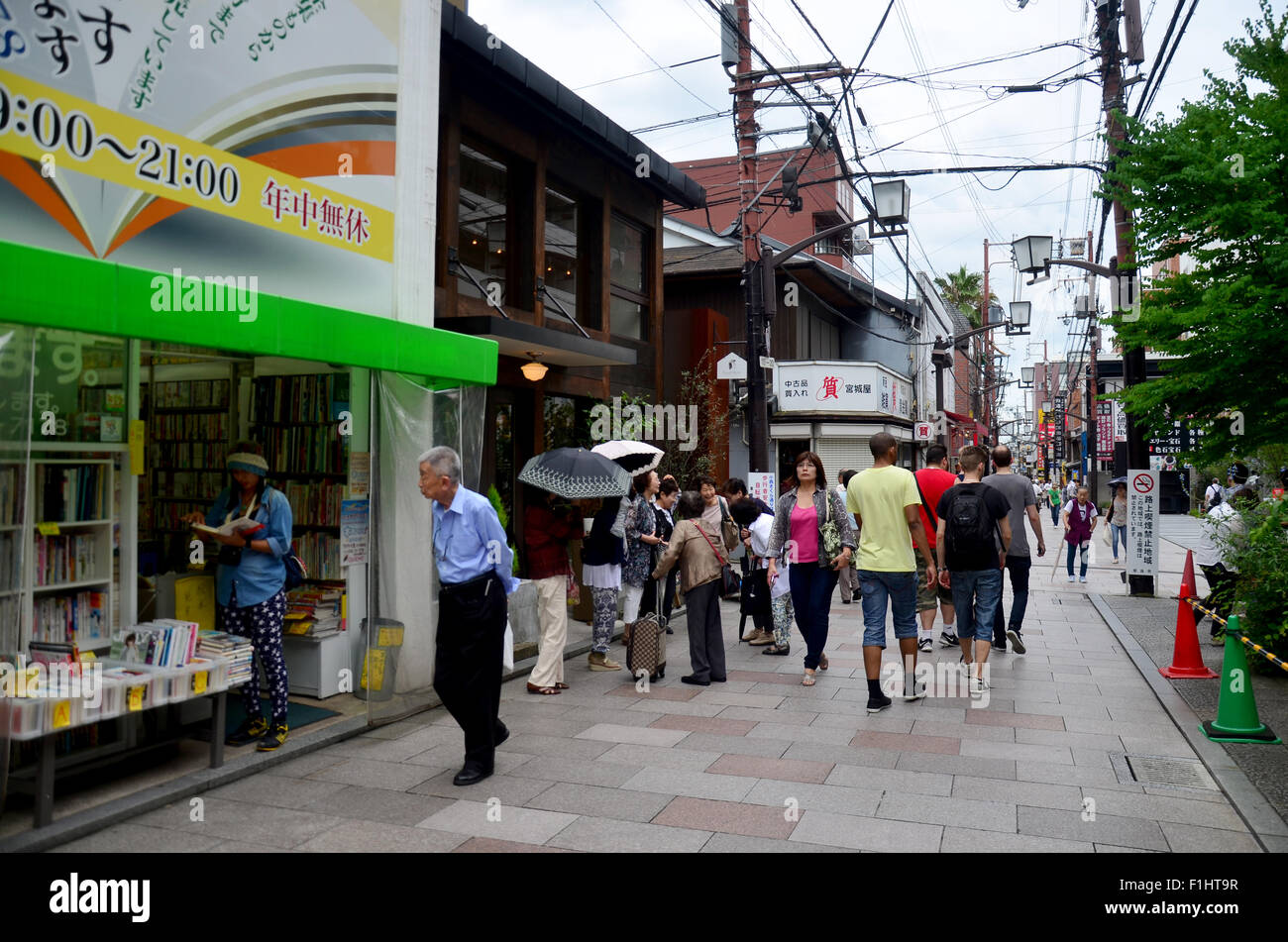 Thai woman travel and shopping at Higashimuki Shopping Street on July 9 ...