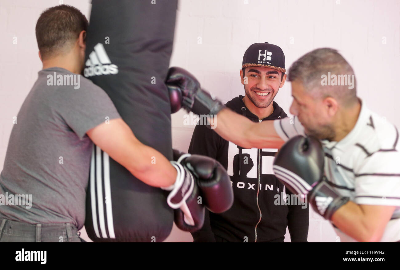 The professional boxer Artem Harutyunyan (in the back) trains with ...