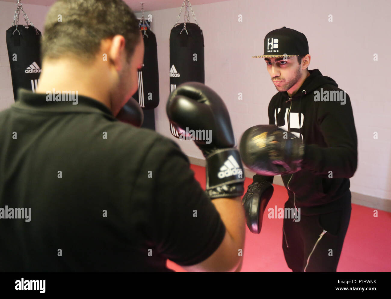 The professional boxer Artem Harutyunyan (R) trains with Syrian ...