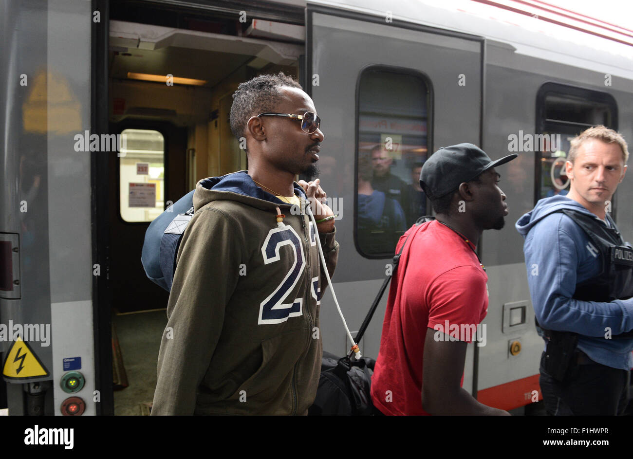 Rosenheim, Germany. 2nd Sep, 2015. Two young men from Nigeria leave a ...