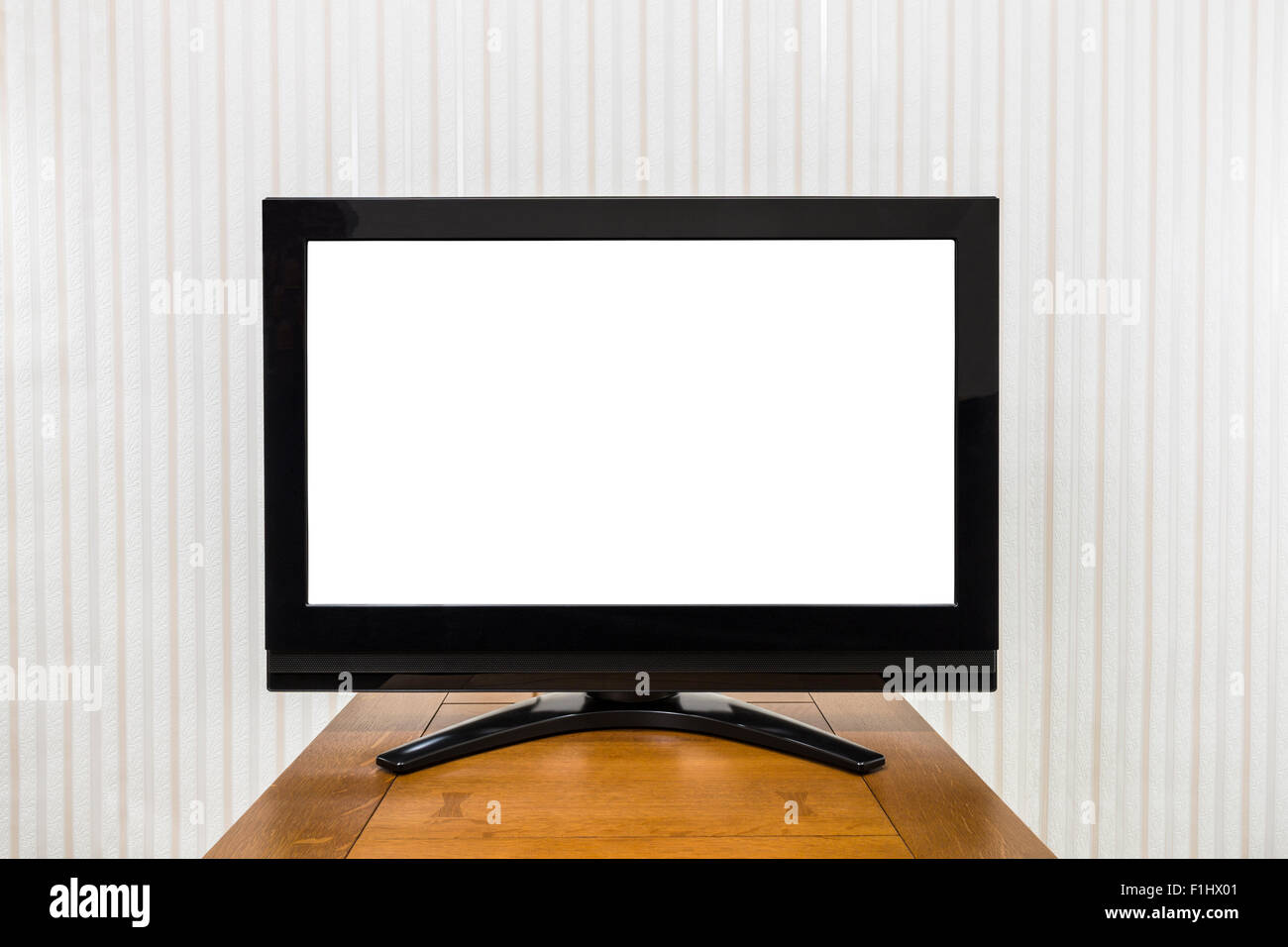 Modern television on wood table with cut out screen Stock Photo - Alamy
