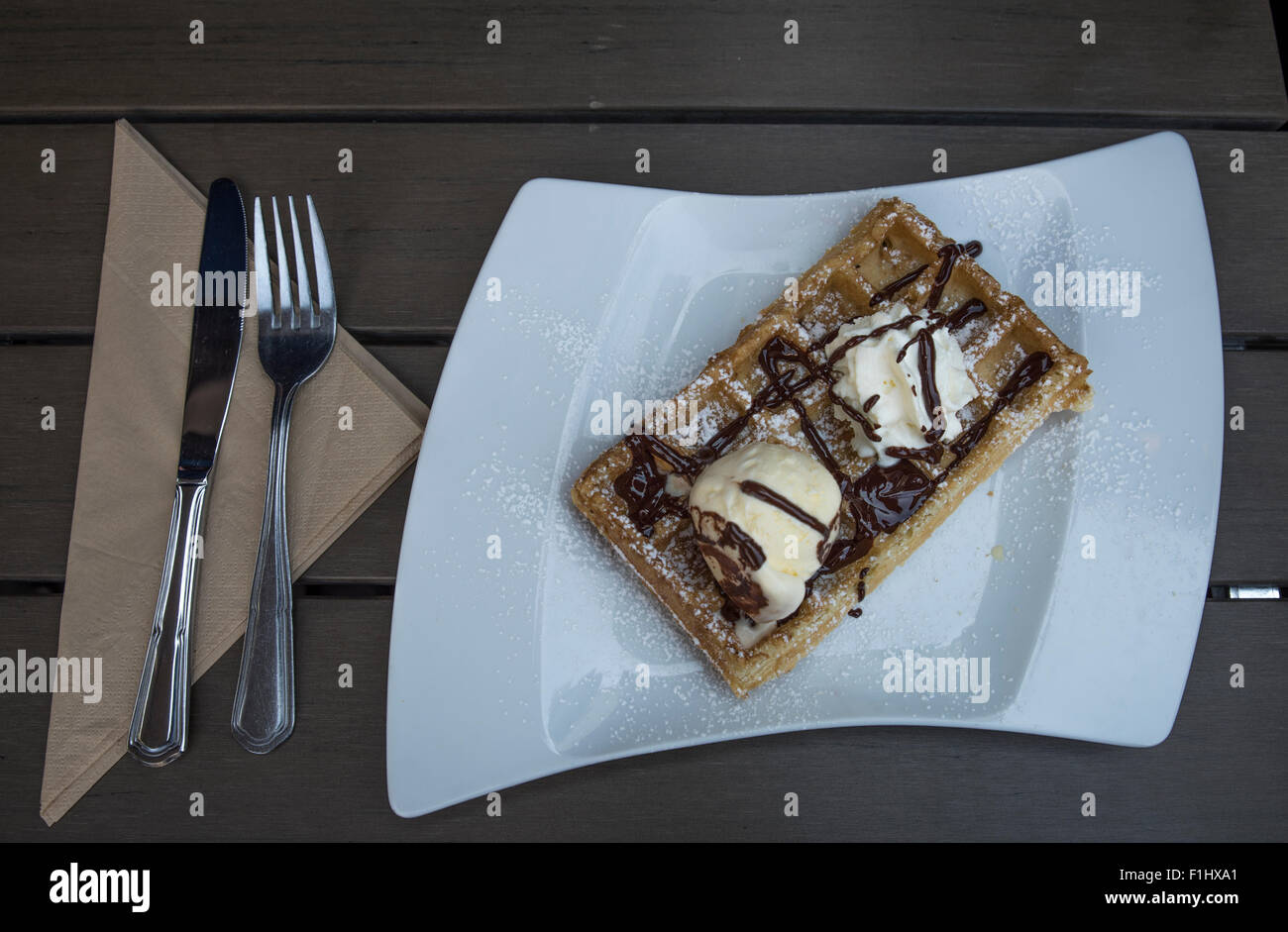 Belgian waffe with ice cream and chocolate hi-res stock photography and ...