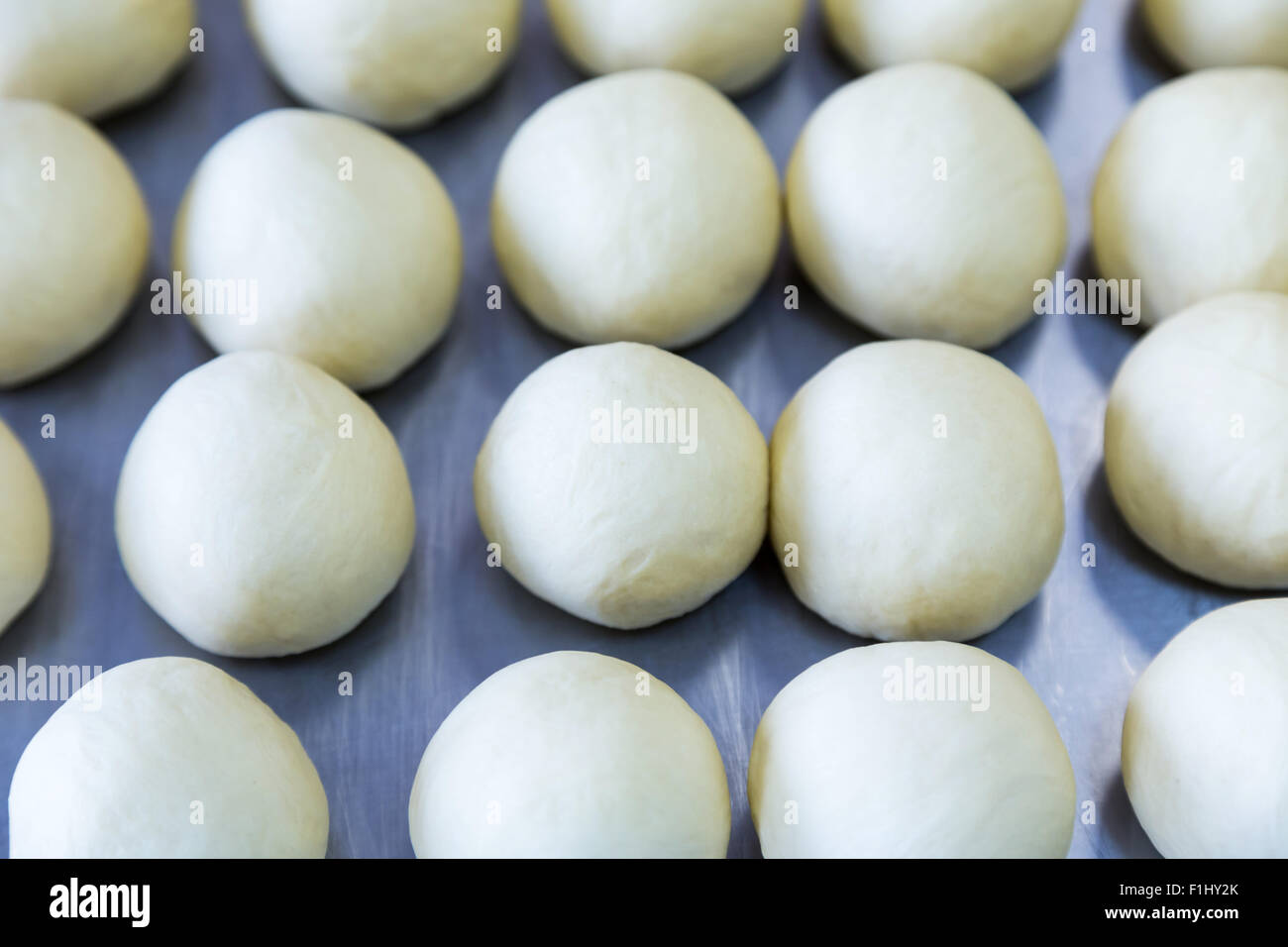 equal uncooked raw pastry half-finished product for backery Stock Photo ...