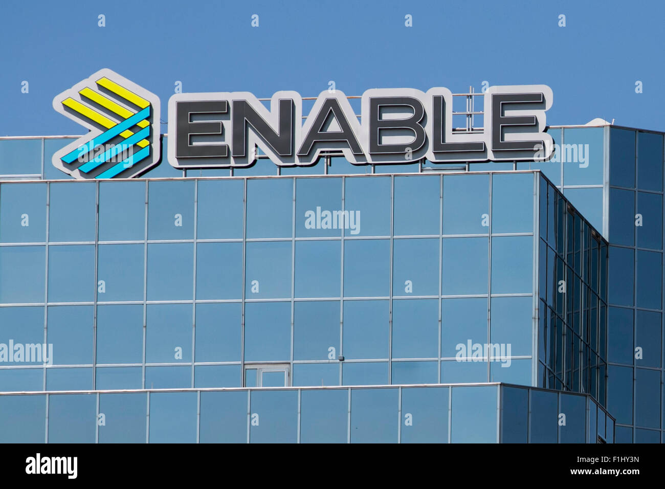 A logo sign outside of the headquarters of Enable Midstream Partners ...