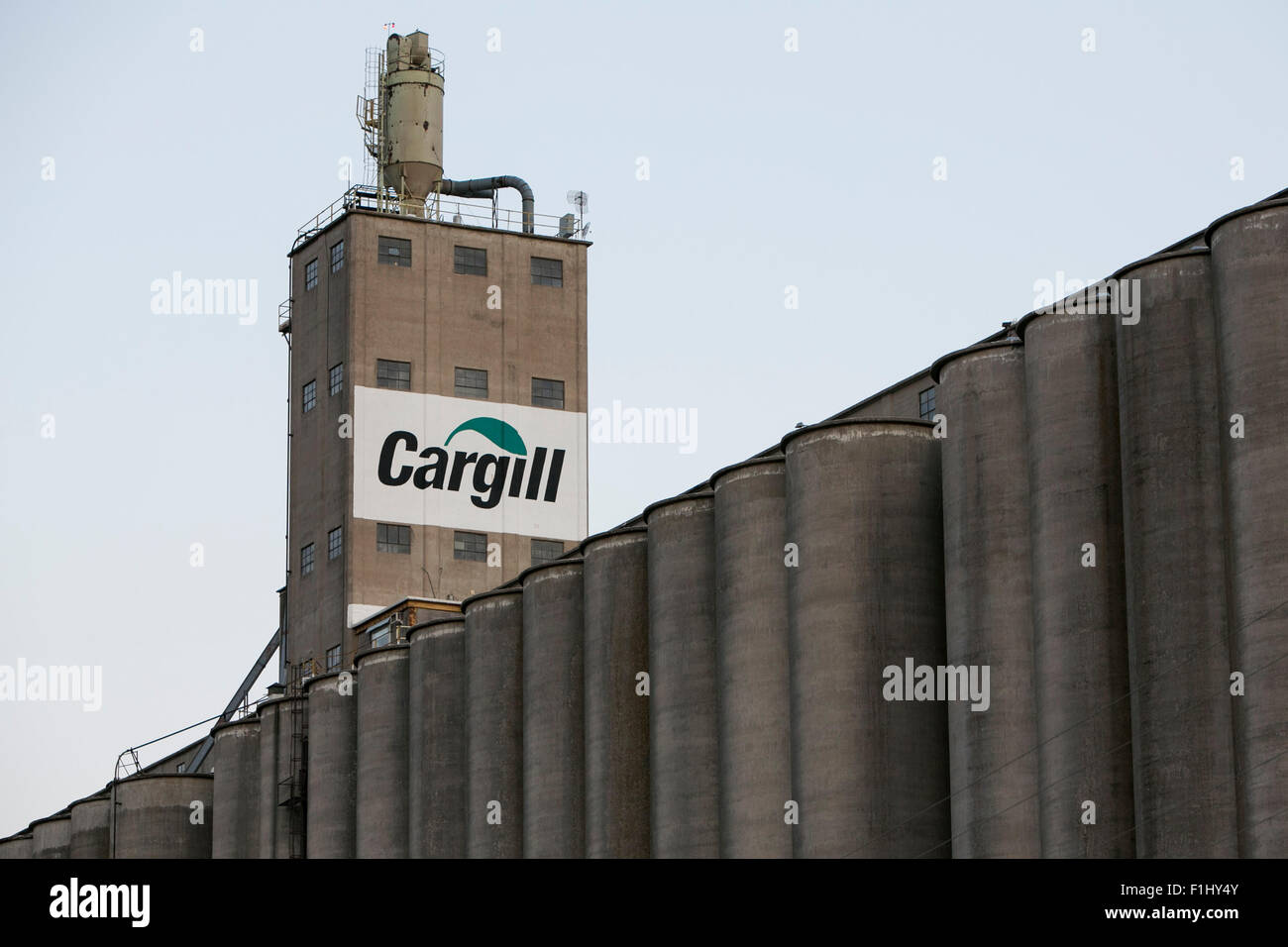 A logo sign outside of a grain elevator facility operated by Cargill ...
