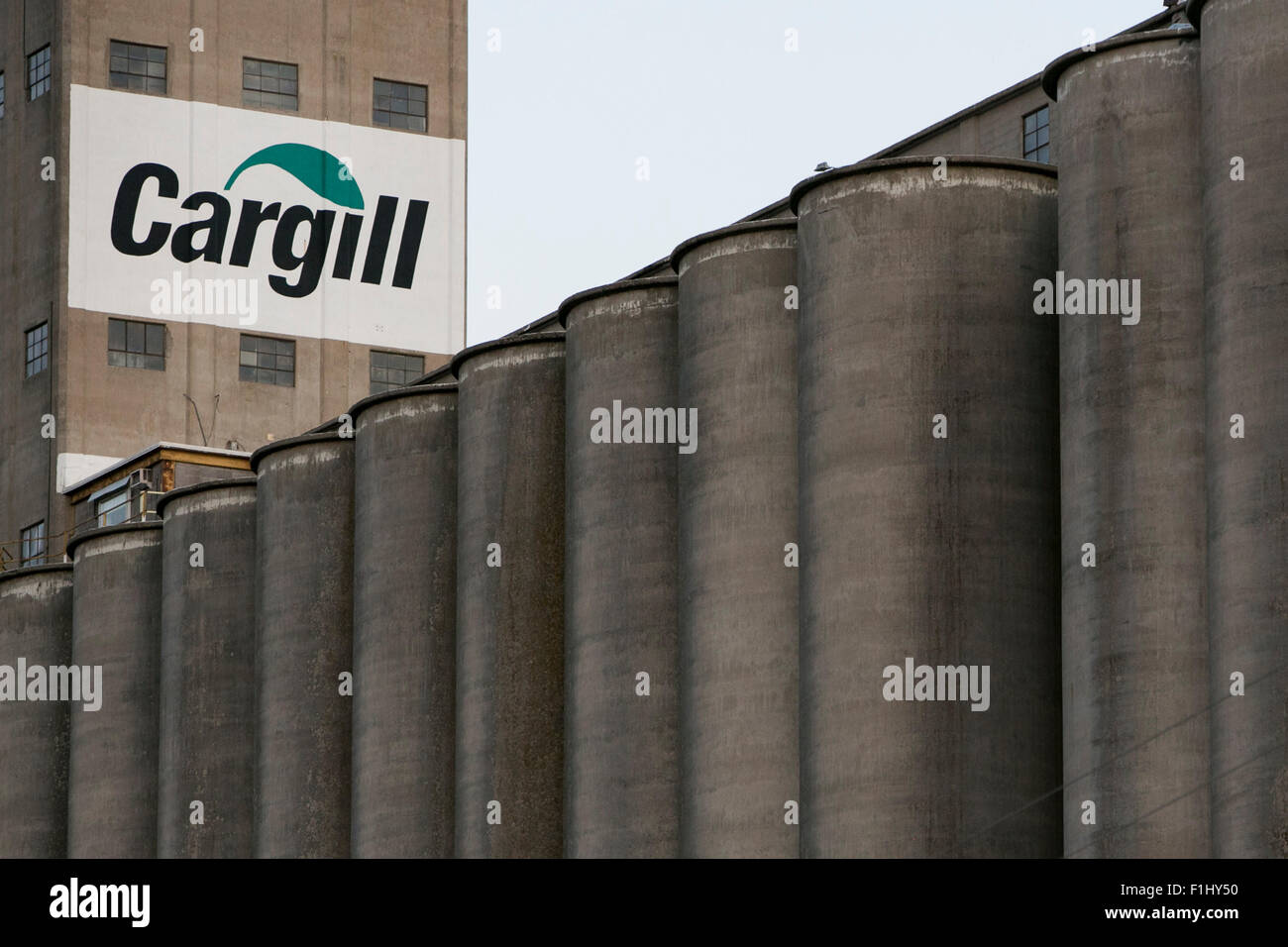 A logo sign outside of a grain elevator facility operated by Cargill ...