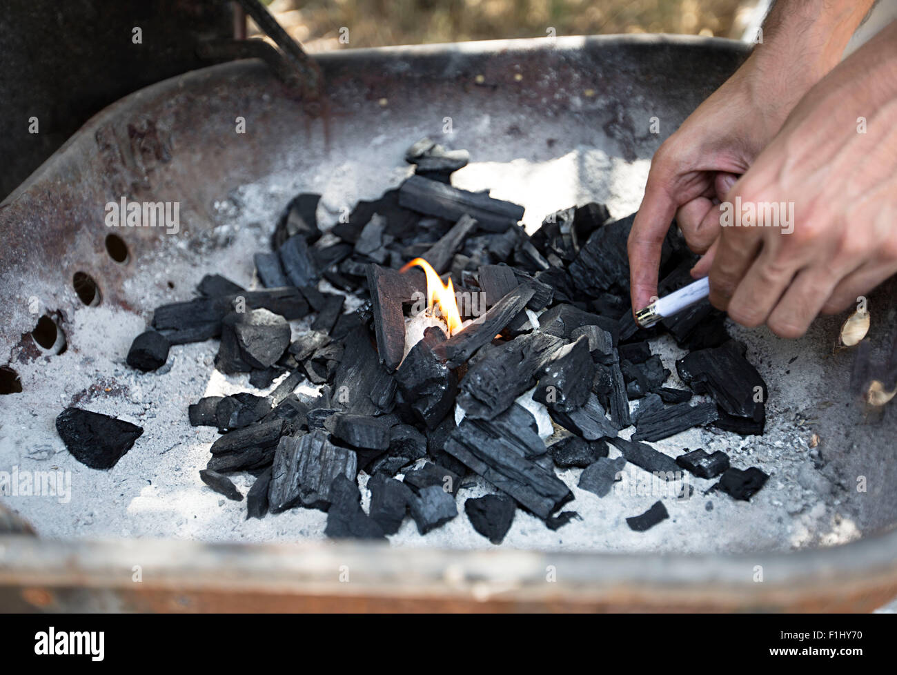 Coal in a grill Stock Photo - Alamy