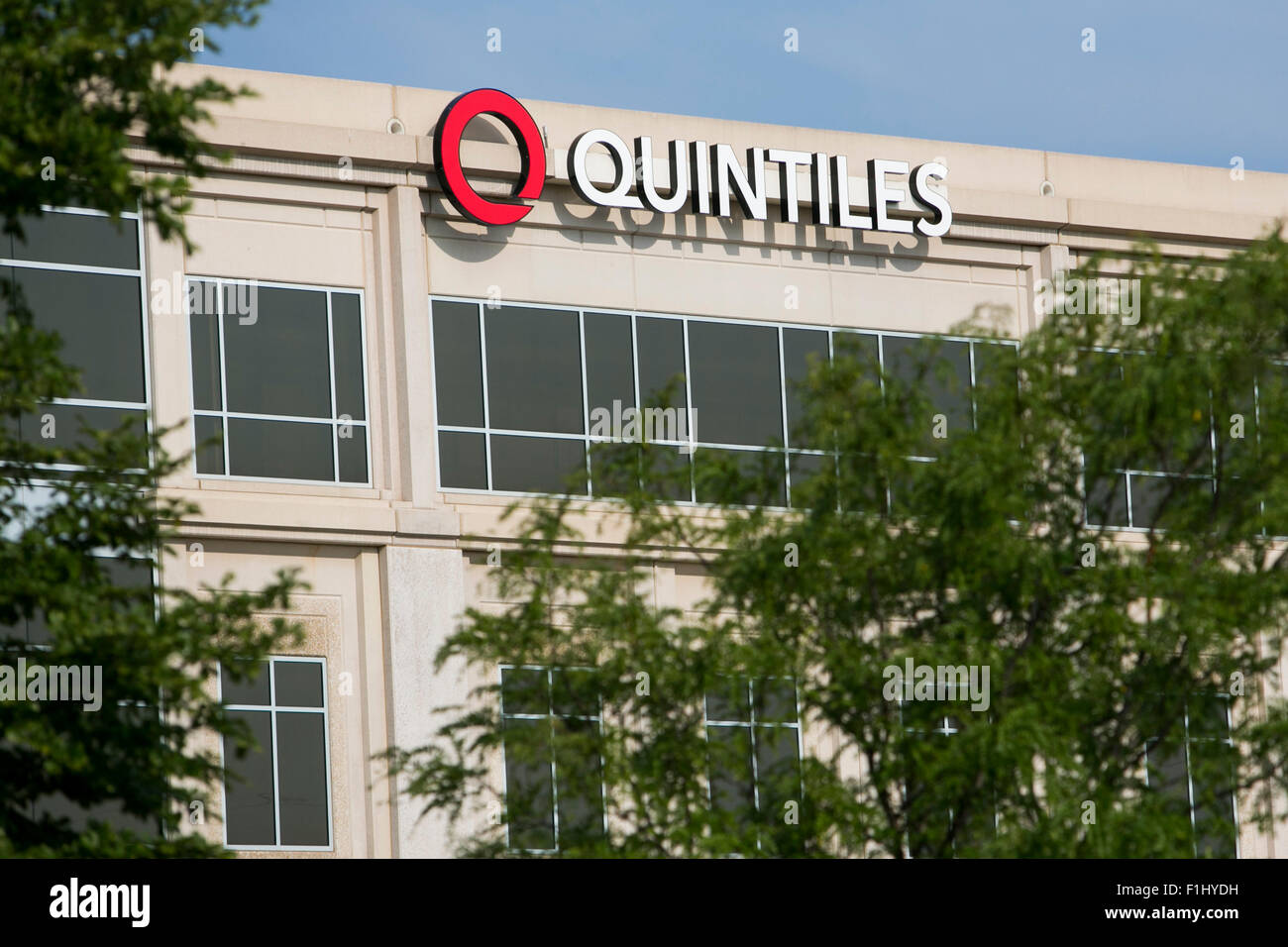 A logo sign outside of a facility occupied by Quintiles Transnational ...