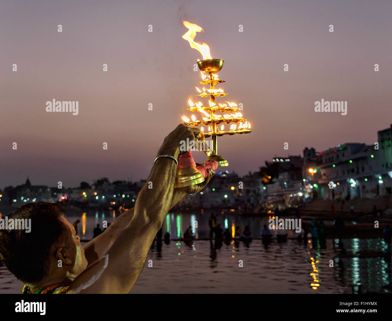 Aarti with fire of Holy Pushkar Lake at evening, Rajasthan, India Stock ...