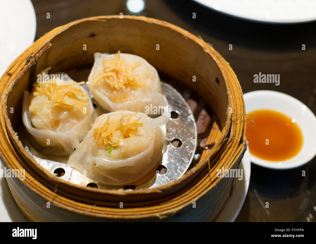 dim sum in bamboo steam containers Stock Photo - Alamy
