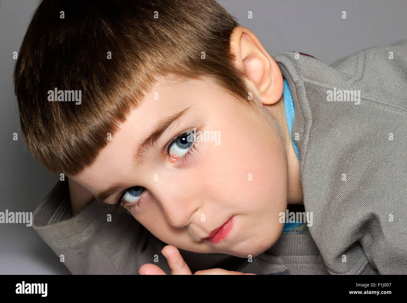 boy portrait reclining Stock Photo - Alamy