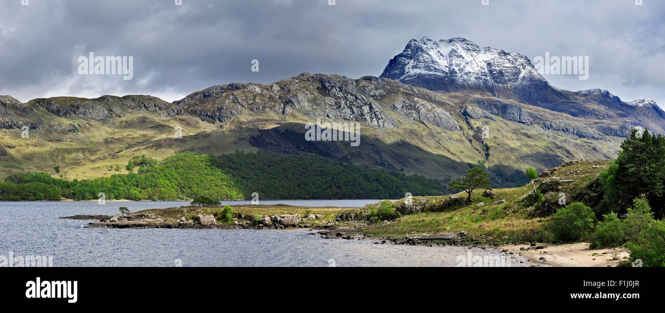 Loch Maree and the mountain Slioch covered in snow in spring, Wester ...