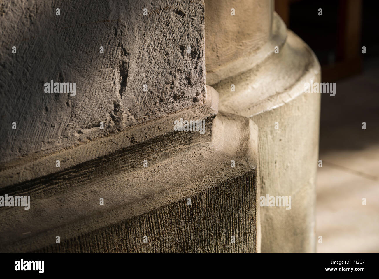 Stone pillar foot in Gothic church Stock Photo - Alamy