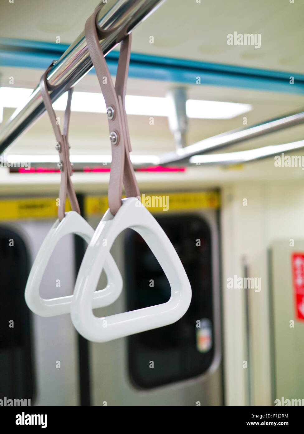Interior subway train handle hi-res stock photography and images - Alamy