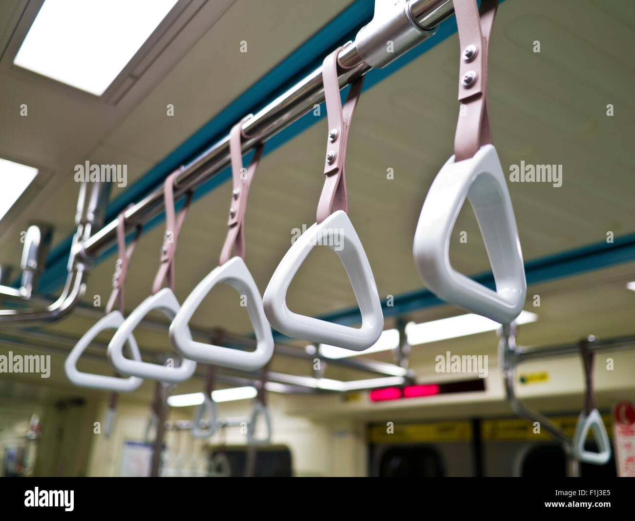 handle on a train Stock Photo - Alamy