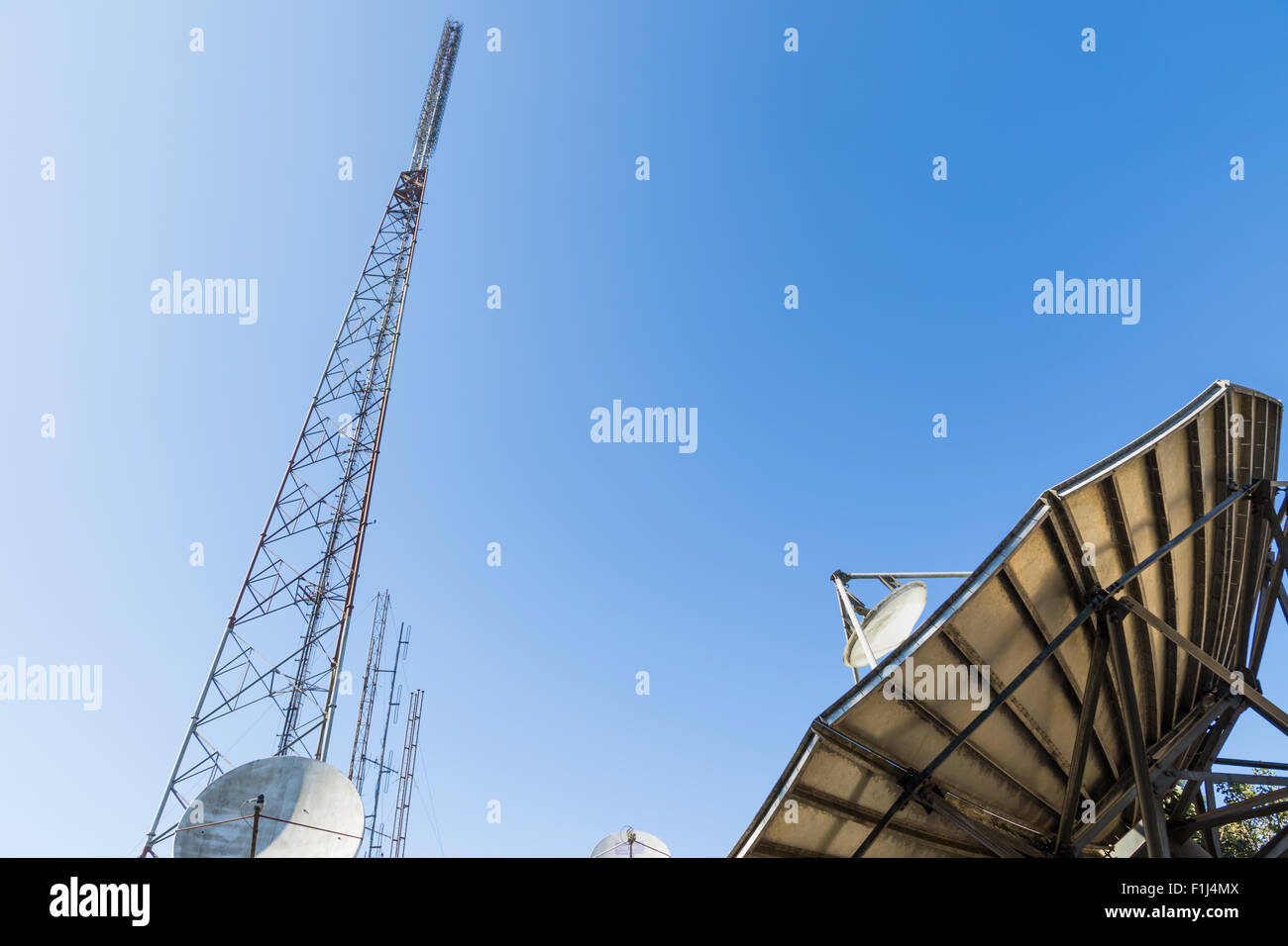 communication tower with analog television antenna transmitters Stock Photo - Alamy