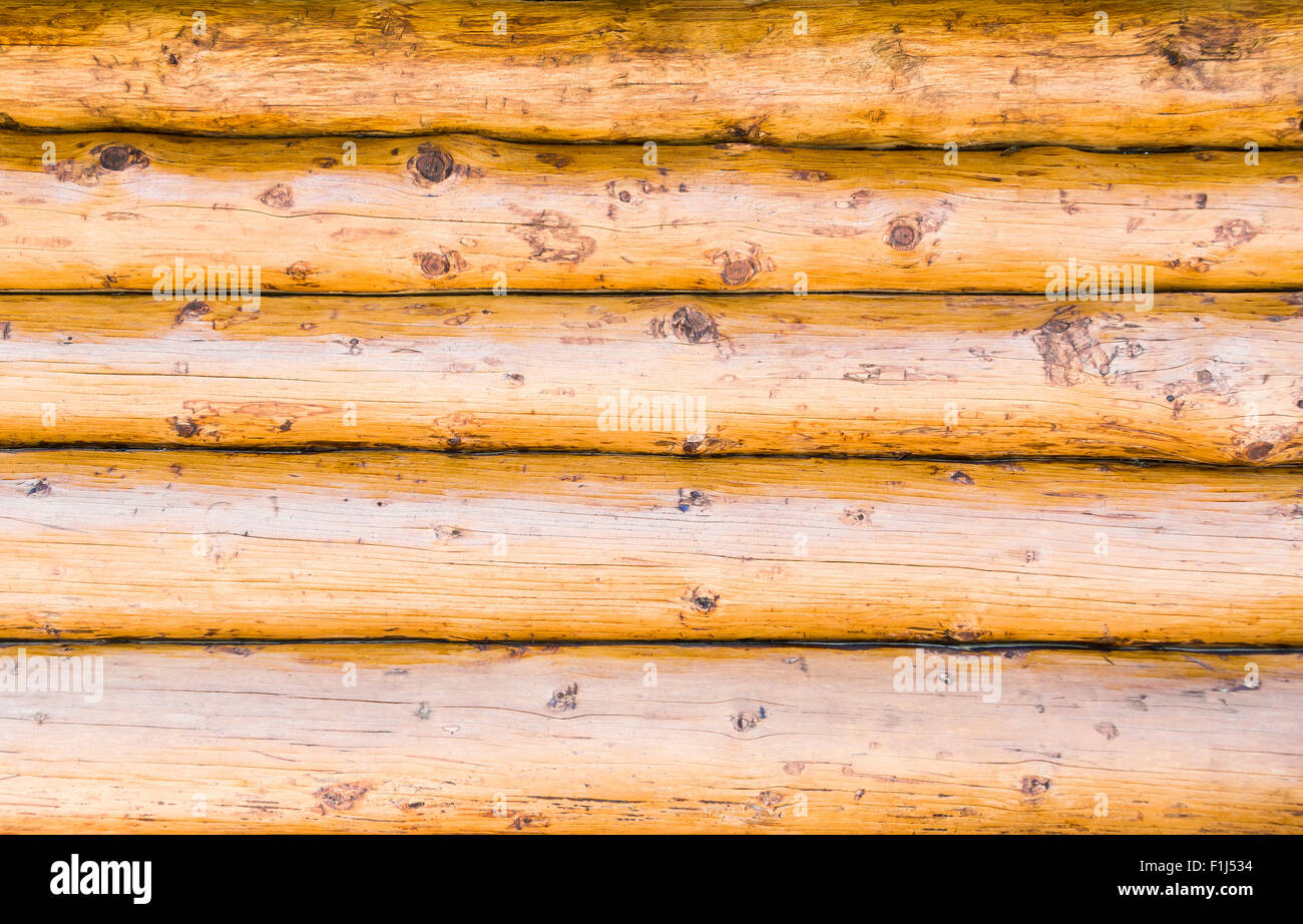 Wall of thick tree logs or beams Stock Photo - Alamy
