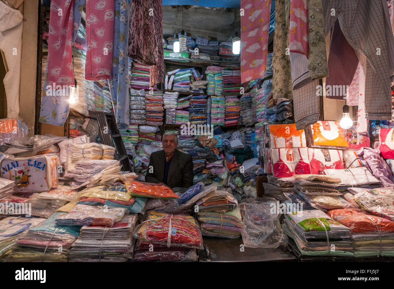 Stall owner selling textile and fabrics hi-res stock photography and ...