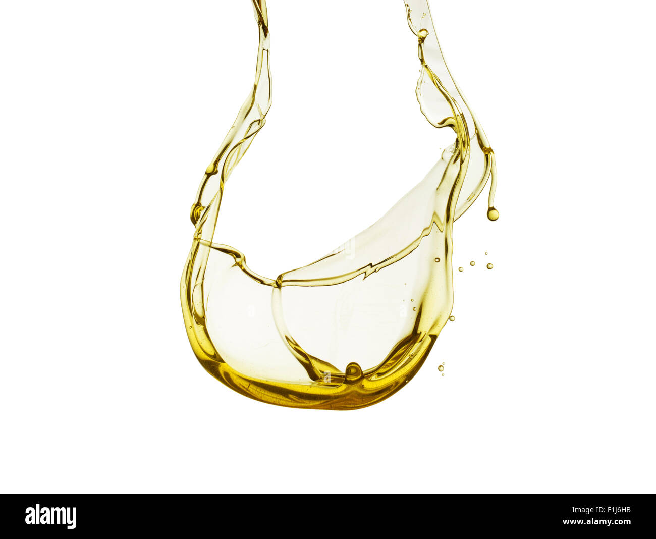 Oil splash isolated on white background Stock Photo - Alamy