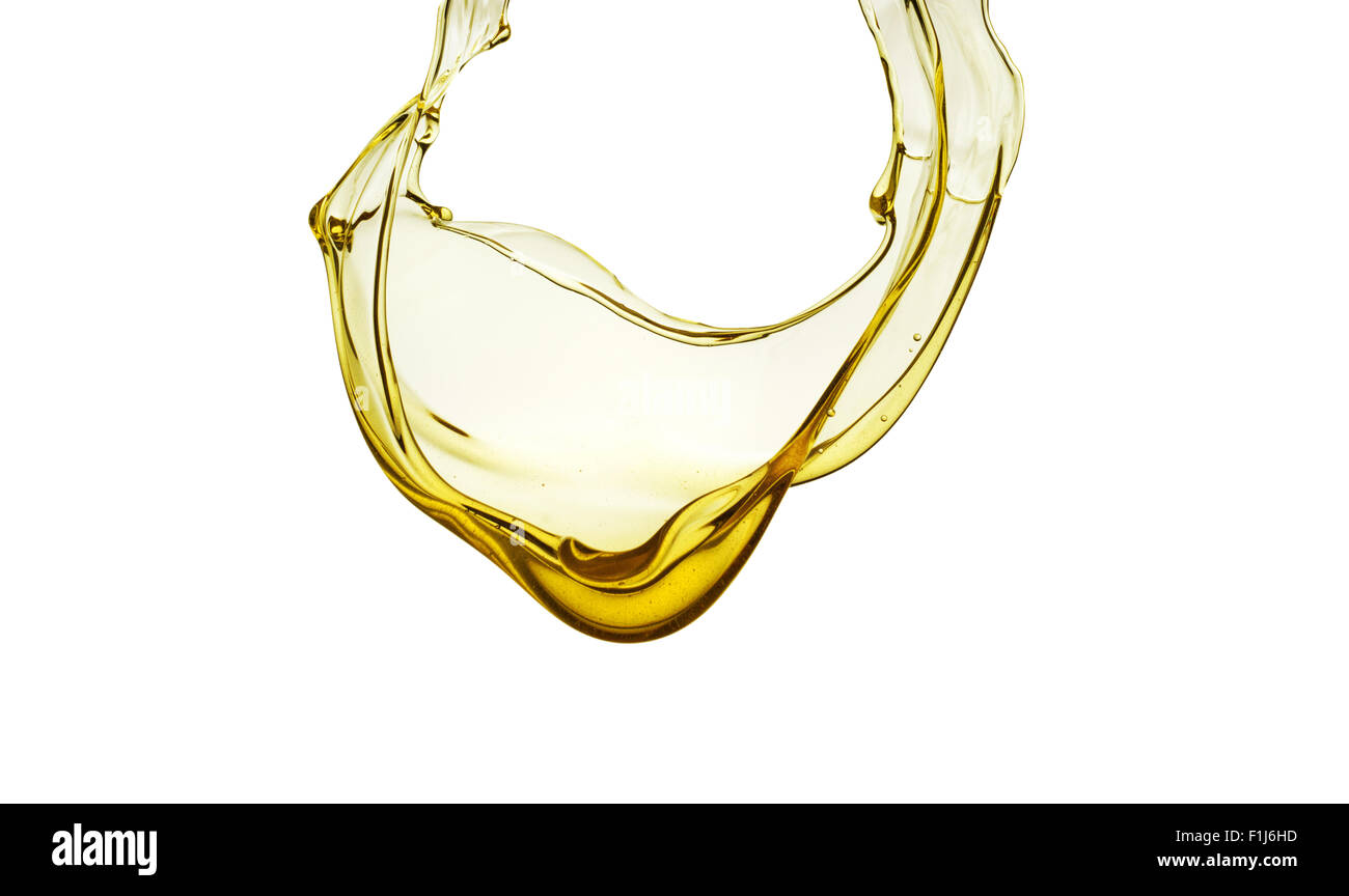 Oil splash isolated on white background Stock Photo - Alamy