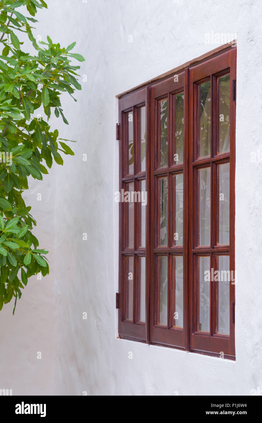Old style window of rural house, brown frame Stock Photo - Alamy