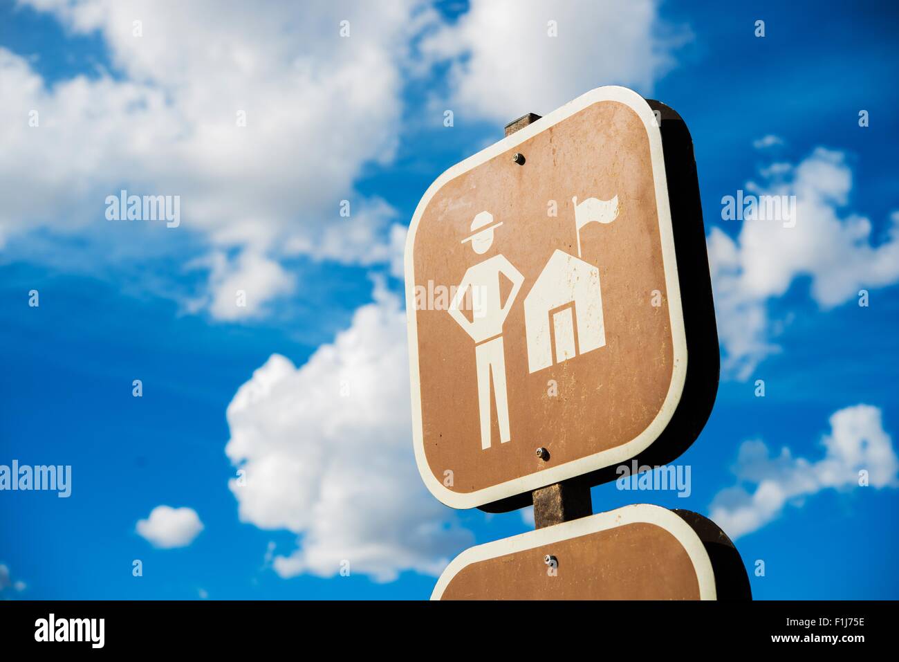 Ranger Station Sign and the Cloudy Blue Sky. National Park Adventure ...