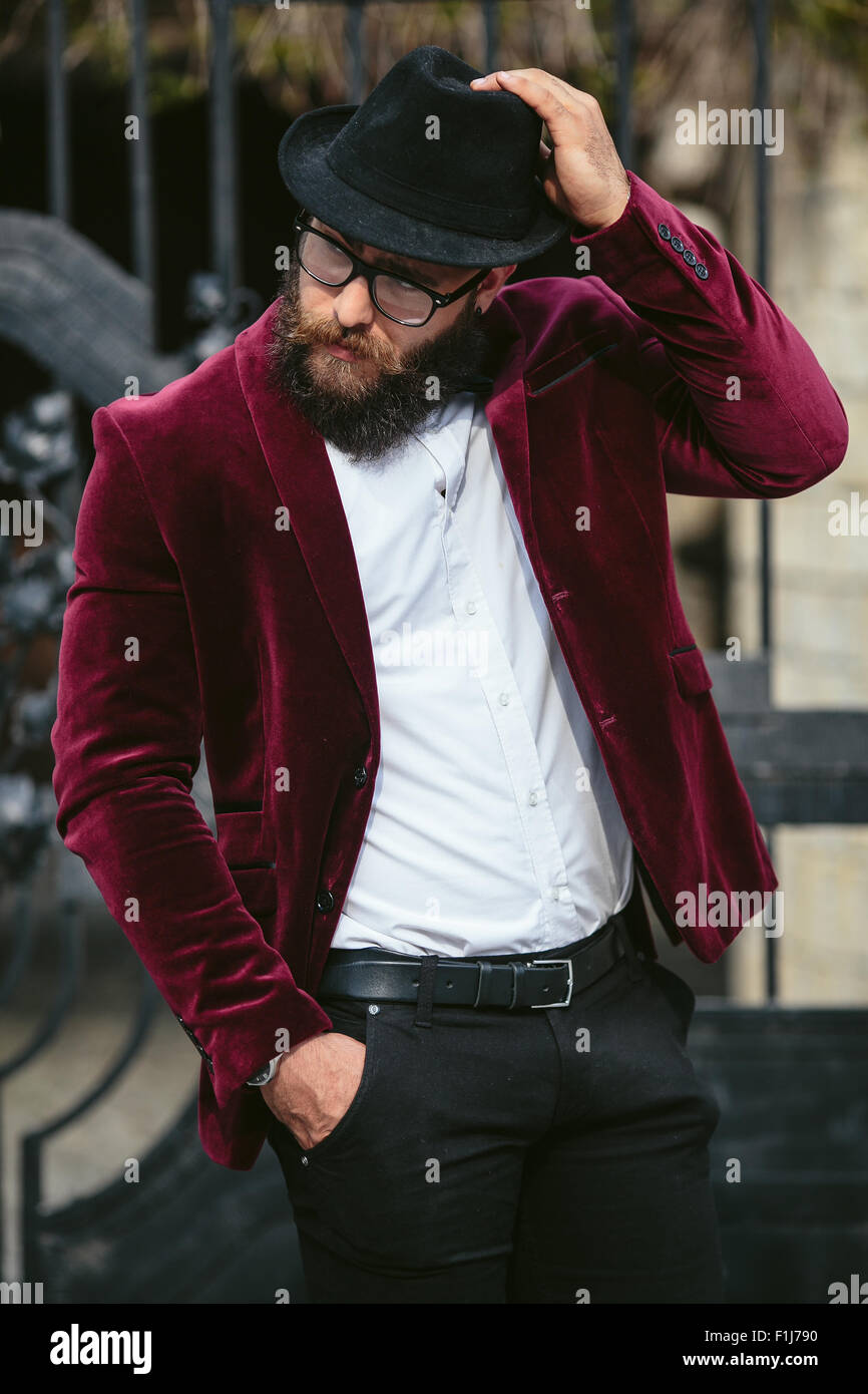 rich man with a beard, thinking about business Stock Photo - Alamy