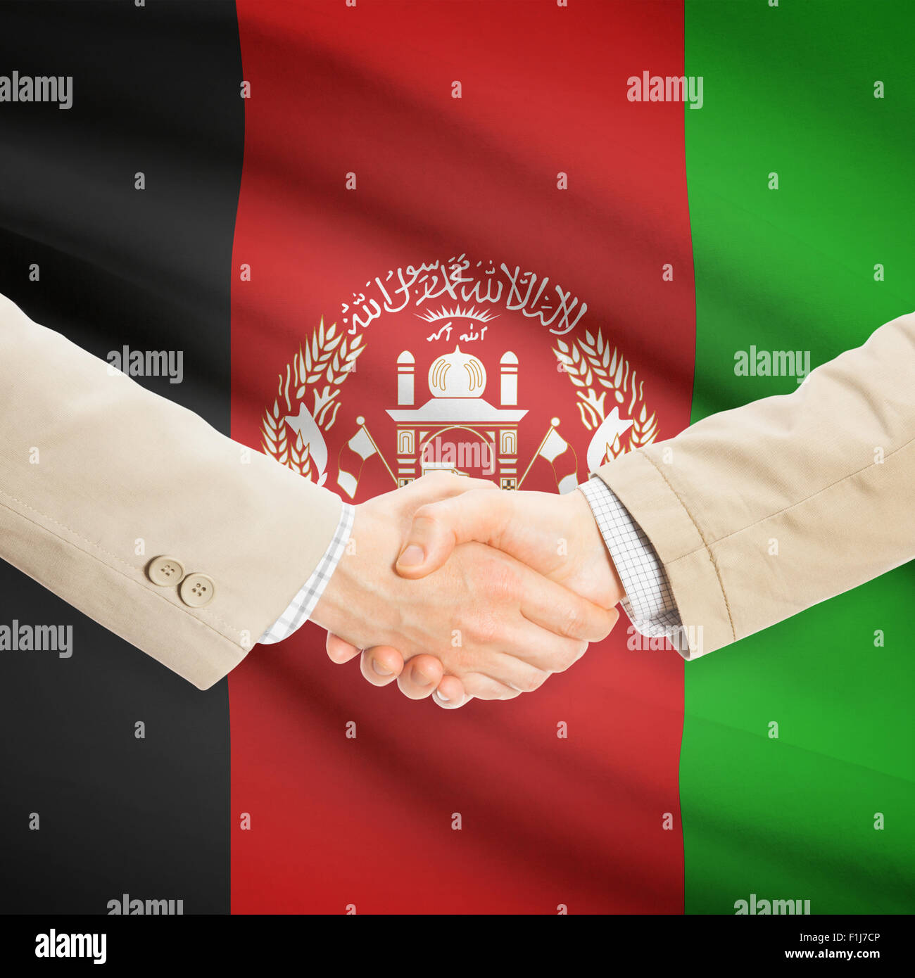 Businessmen shaking hands with flag on background - Afghanistan Stock ...