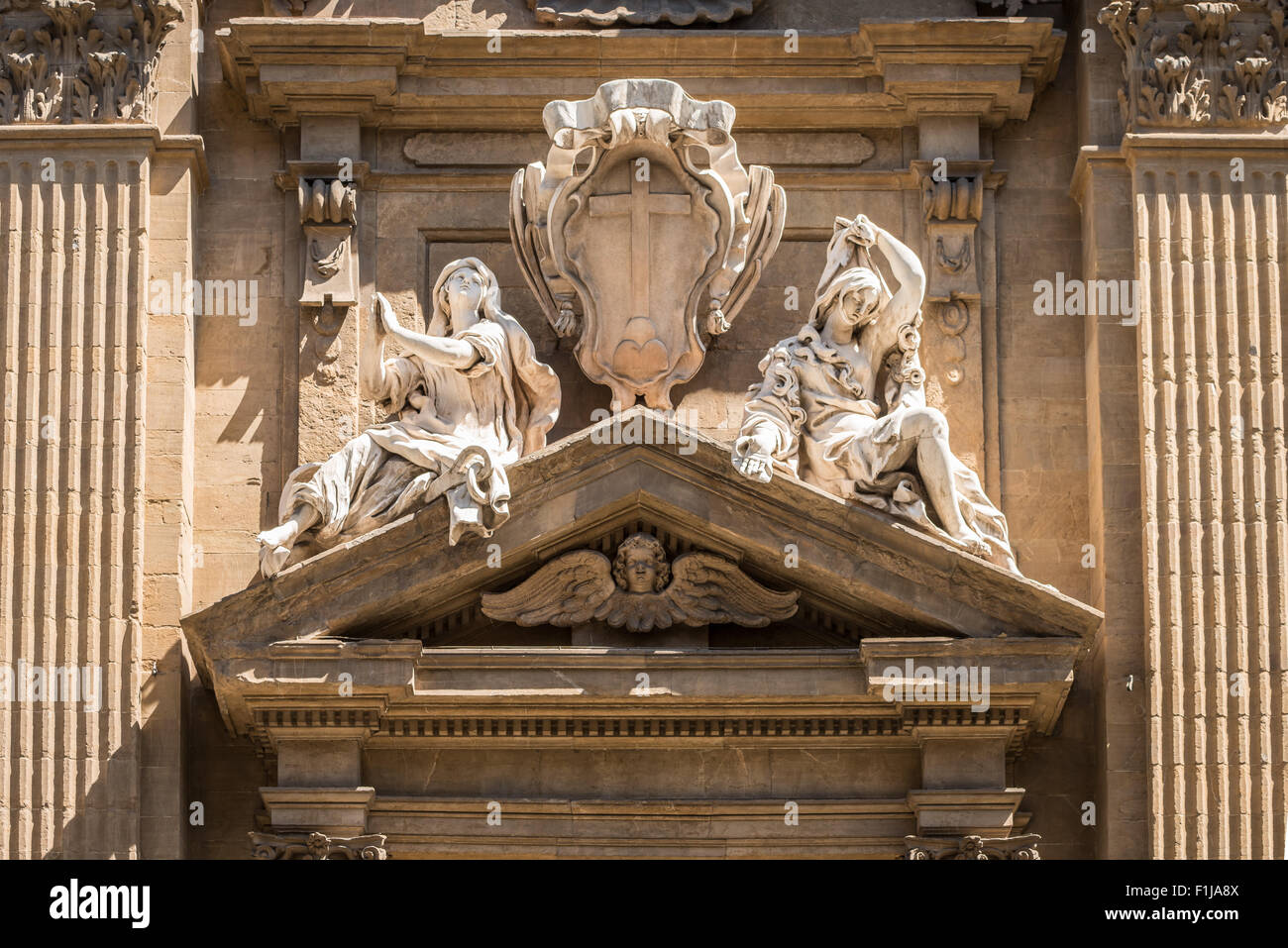 In the picture a marble statue of the Middle Ages showing two women, in ...