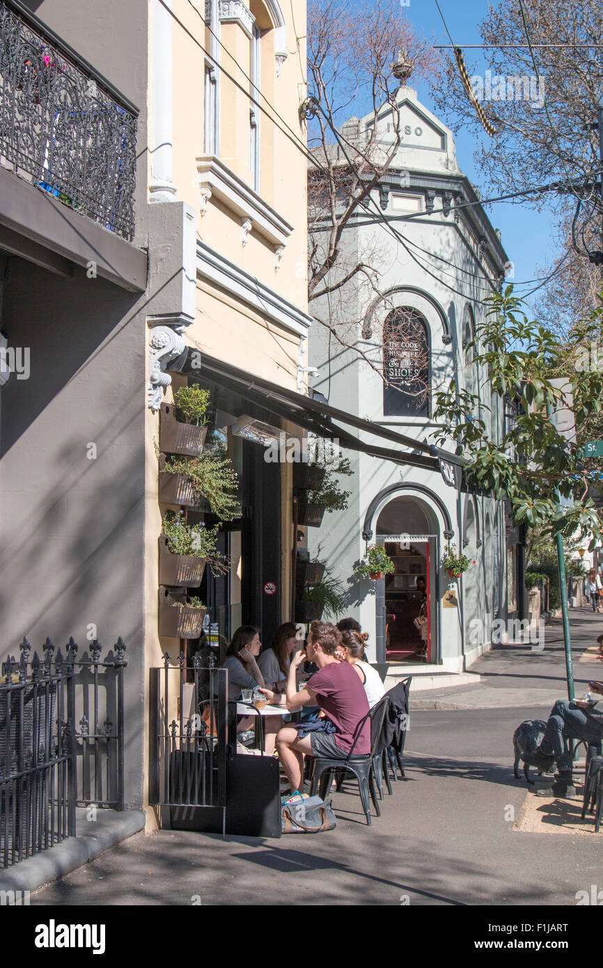 people dining outside at a cafe in the trendy suburb of Surry Hills ...