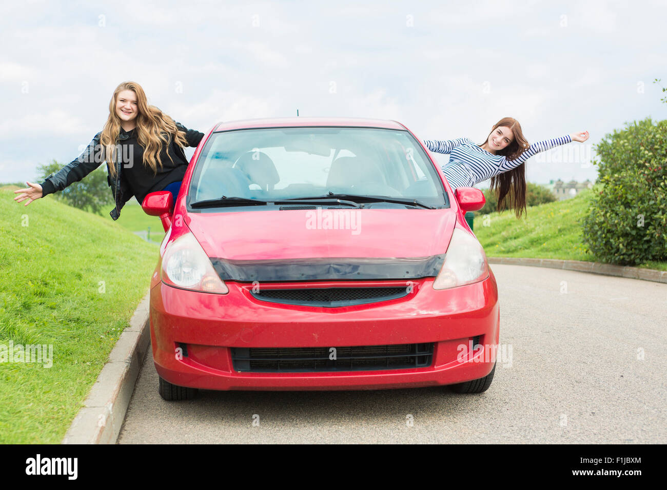 Woman driver outside Stock Photo - Alamy