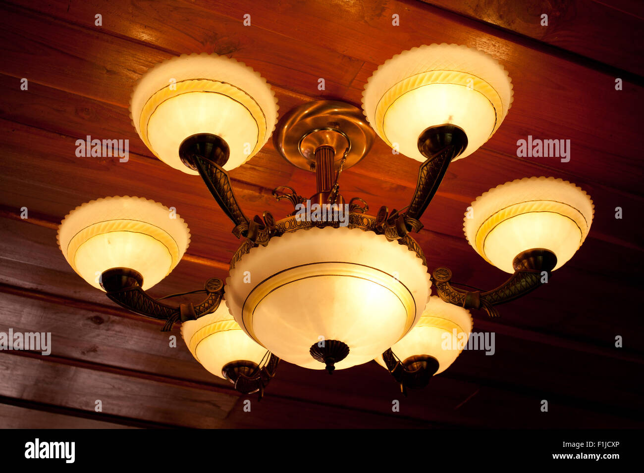 Vintage ceiling lamp fixture in dark hallway Stock Photo - Alamy