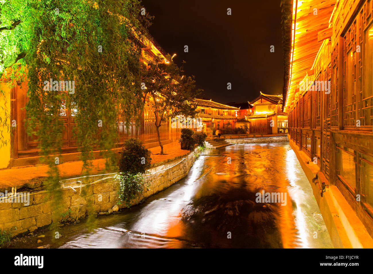 night scene of famous tourist attraction in China - Lijiang old town ...