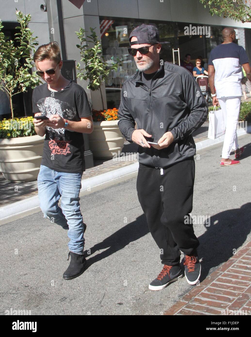 Fred Durst takes his son Dallas Durst shopping at The Grove Featuring ...