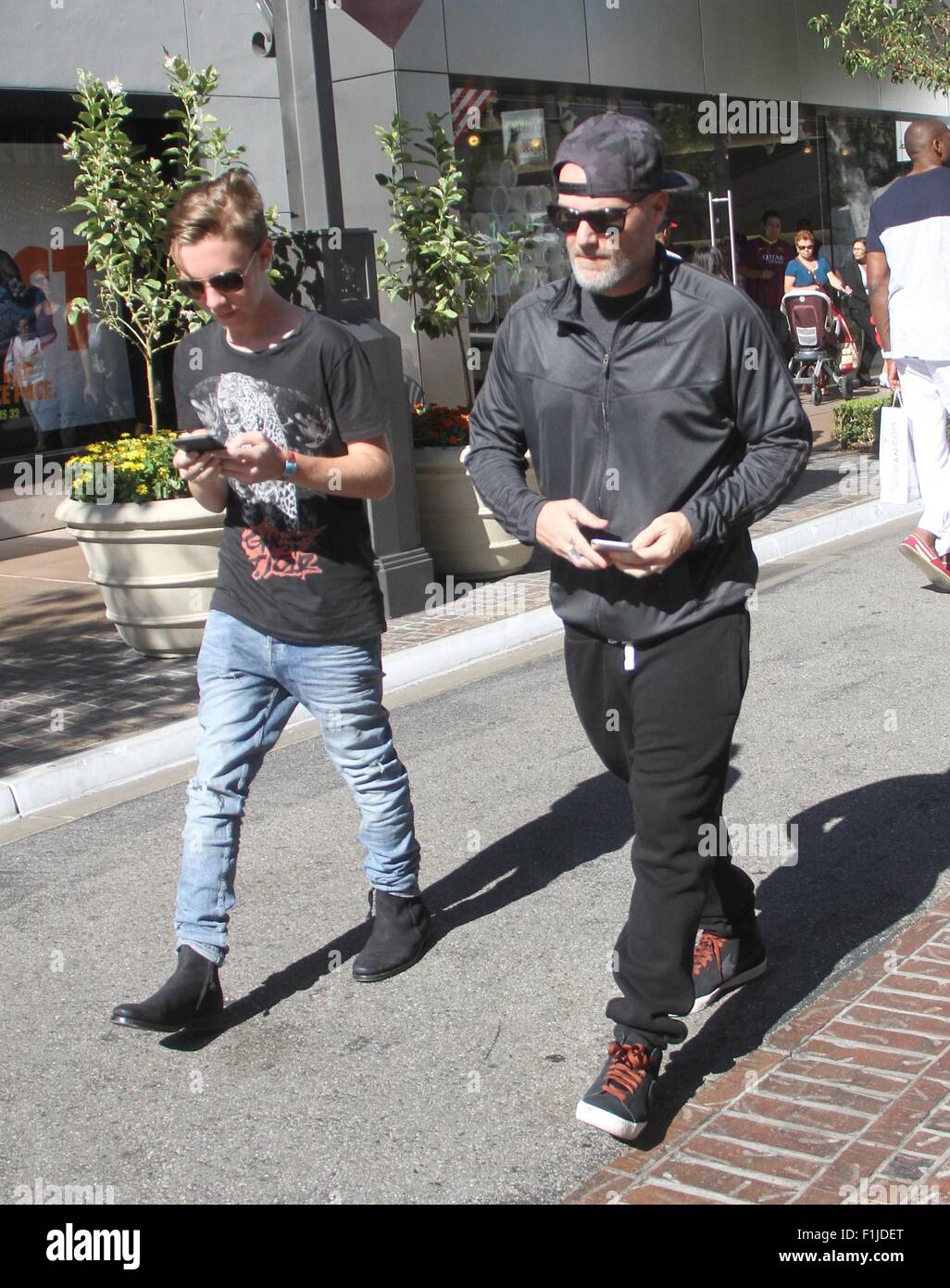 Fred Durst takes his son Dallas Durst shopping at The Grove Featuring ...