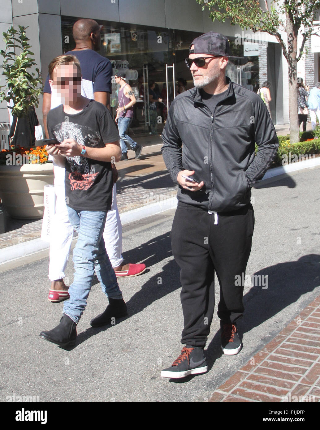 Fred Durst takes his son Dallas Durst shopping at The Grove Featuring ...