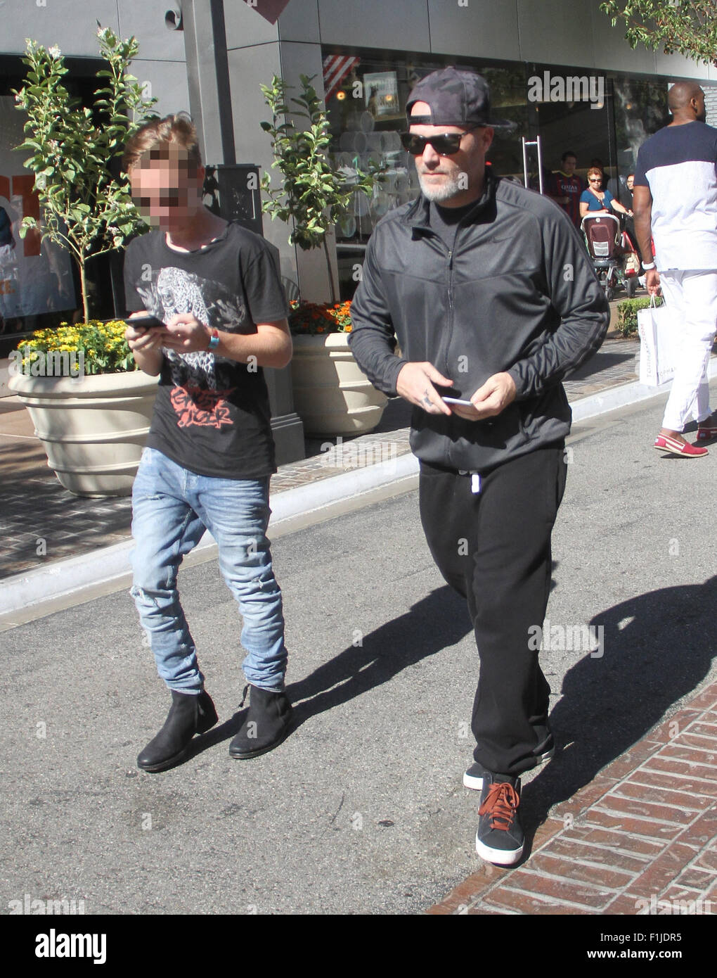 Fred Durst takes his son Dallas Durst shopping at The Grove Featuring ...