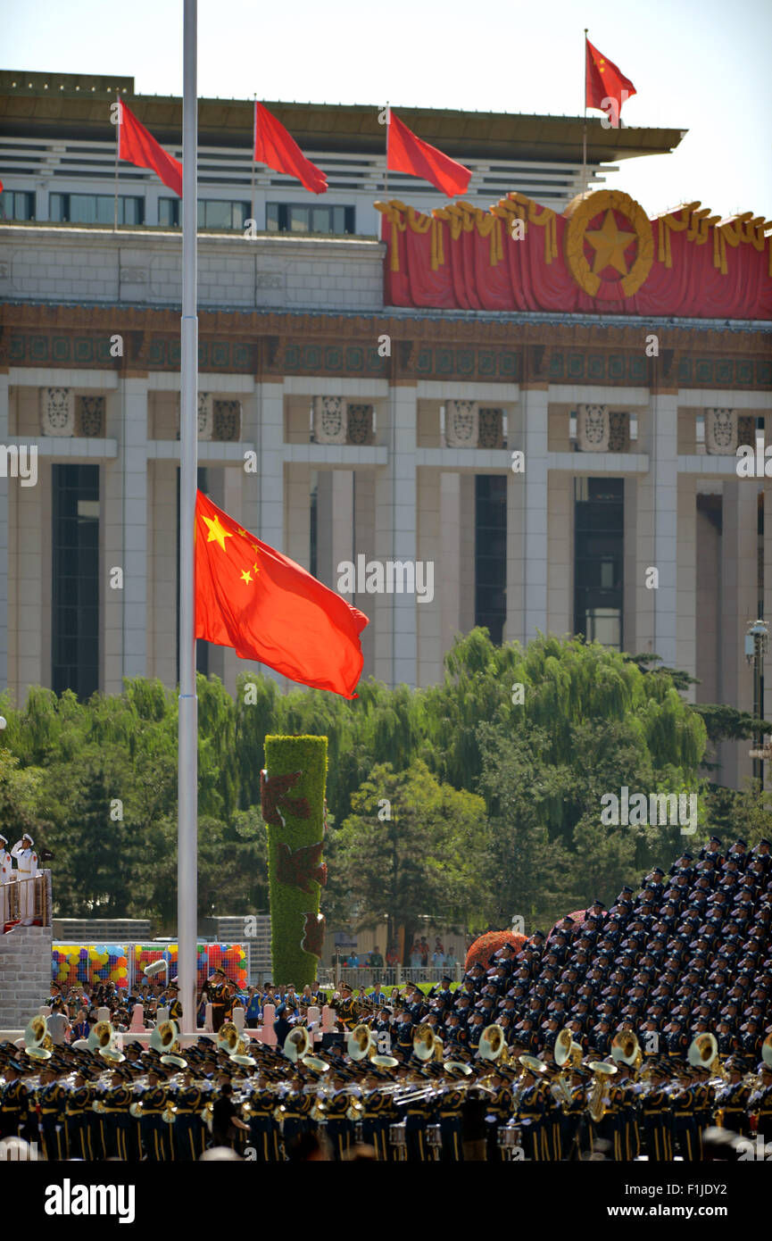 Beijing, China. 3rd Sep, 2015. A flag-raising ceremony is held during ...