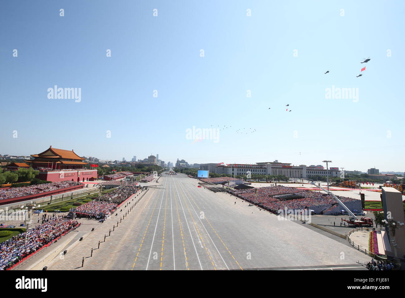 Beijing, China. 3rd Sep, 2015. Helicopters escorting the flags attend a ...
