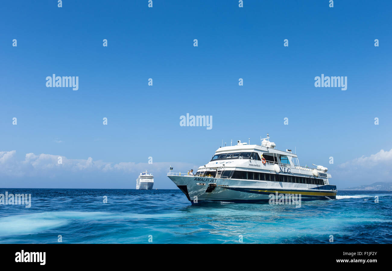 An Amalfi shuttle boat transports the tourists between Amalfi coast and ...