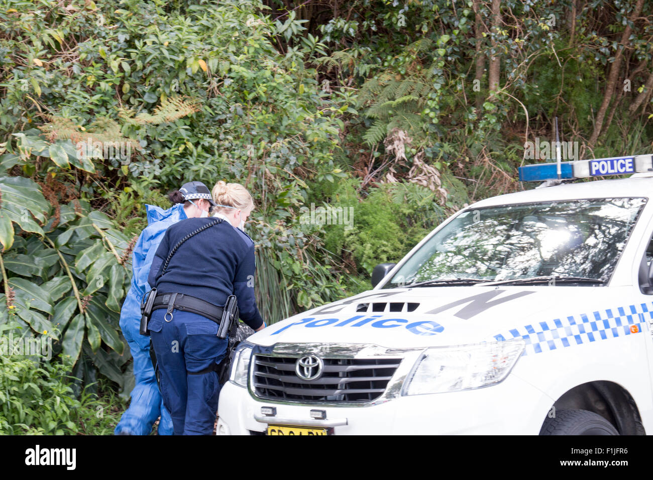 Forensic uniform hi-res stock photography and images - Alamy