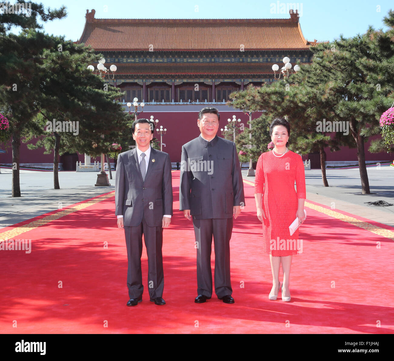 Beijing, China. 3rd Sep, 2015. Chinese President Xi Jinping (C) and his ...