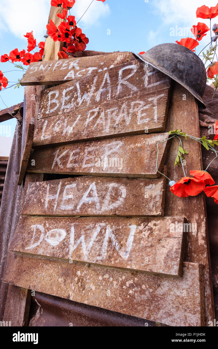 World War One British trench, reenactment. Warning sign made from ...