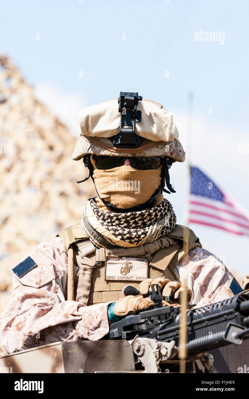 American army, Iraq re-enactment. Soldier, face covered, looking ...