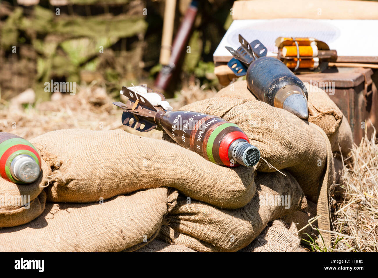 Second world war re-enactment. Three British types of 3 inch mortar ...