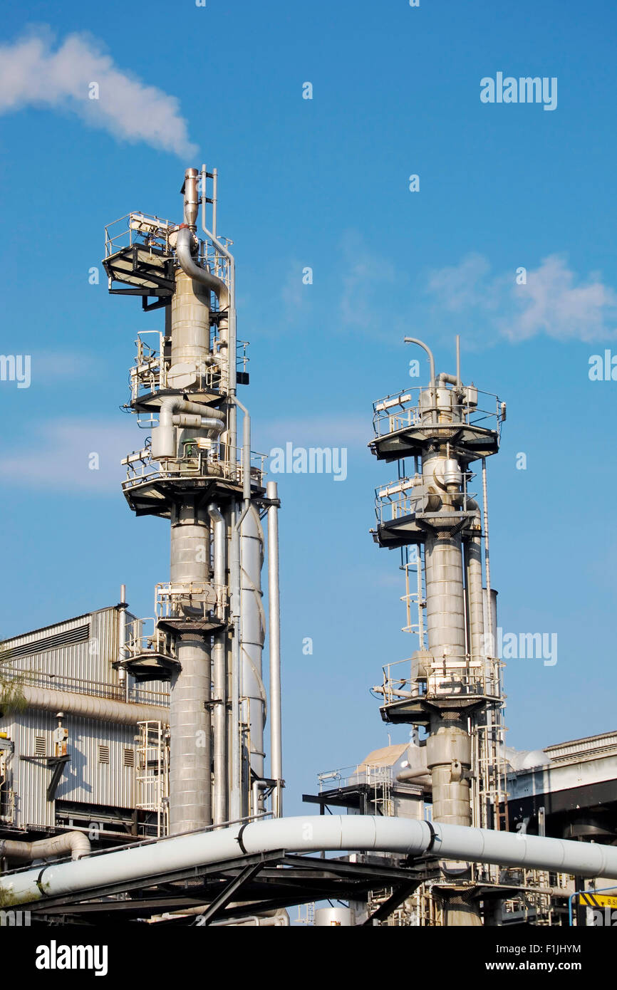 Chimneys of industrial plant Stock Photo - Alamy